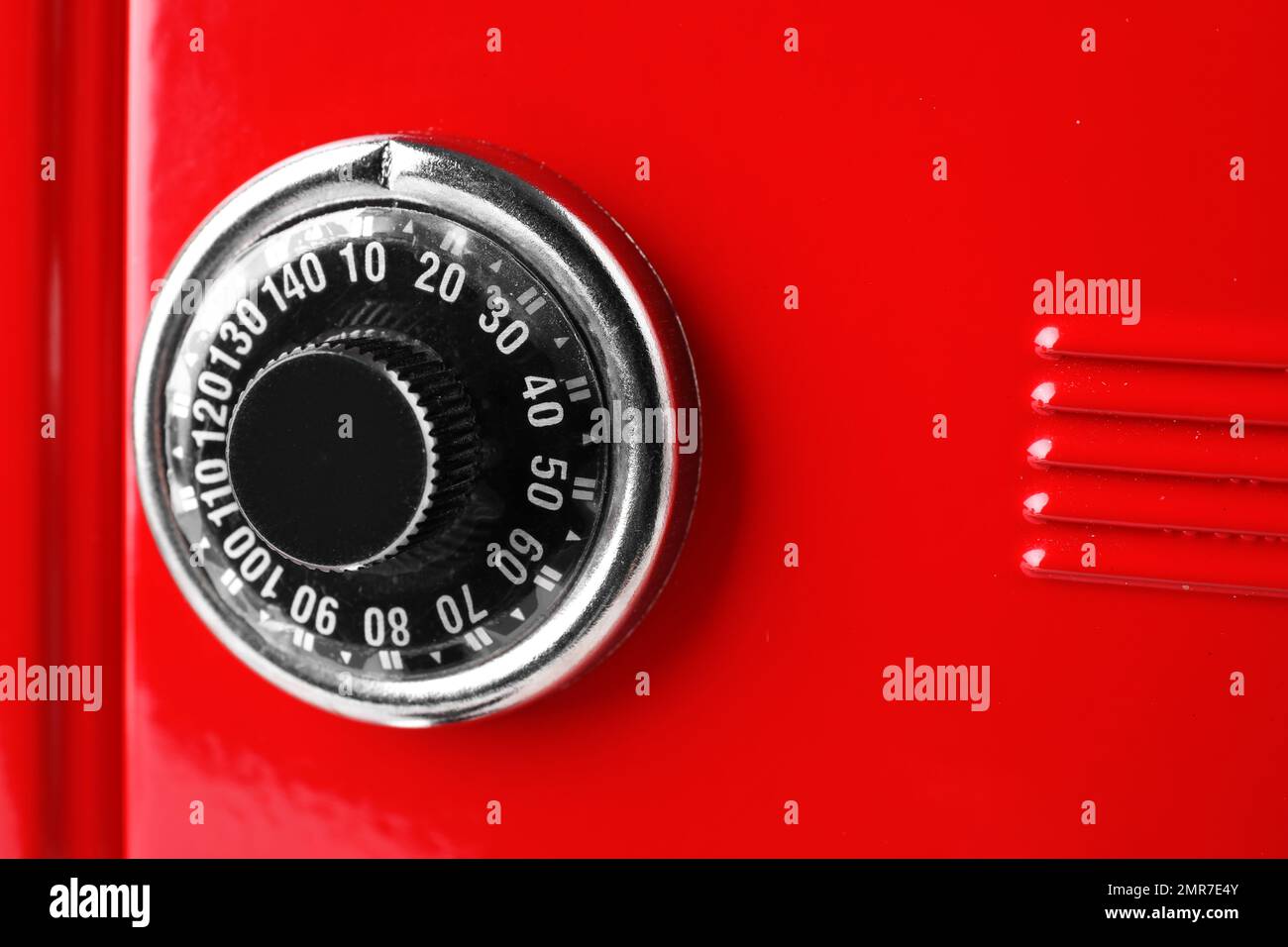 Red steel safe with mechanical combination lock, closeup Stock Photo ...