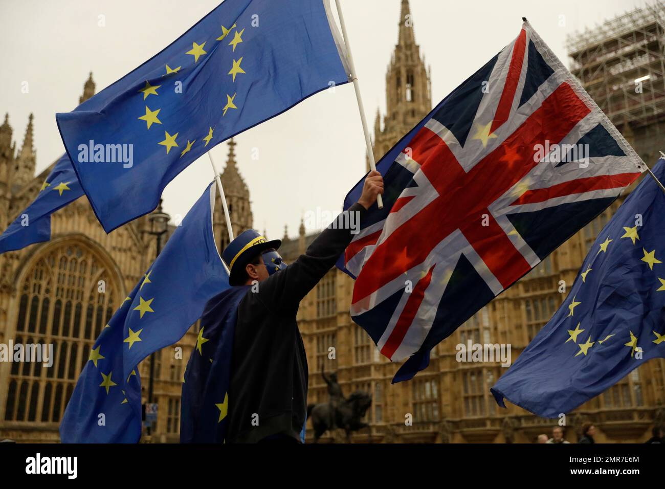 Pro-EU supporters hold European Union flags with a Union flag across ...