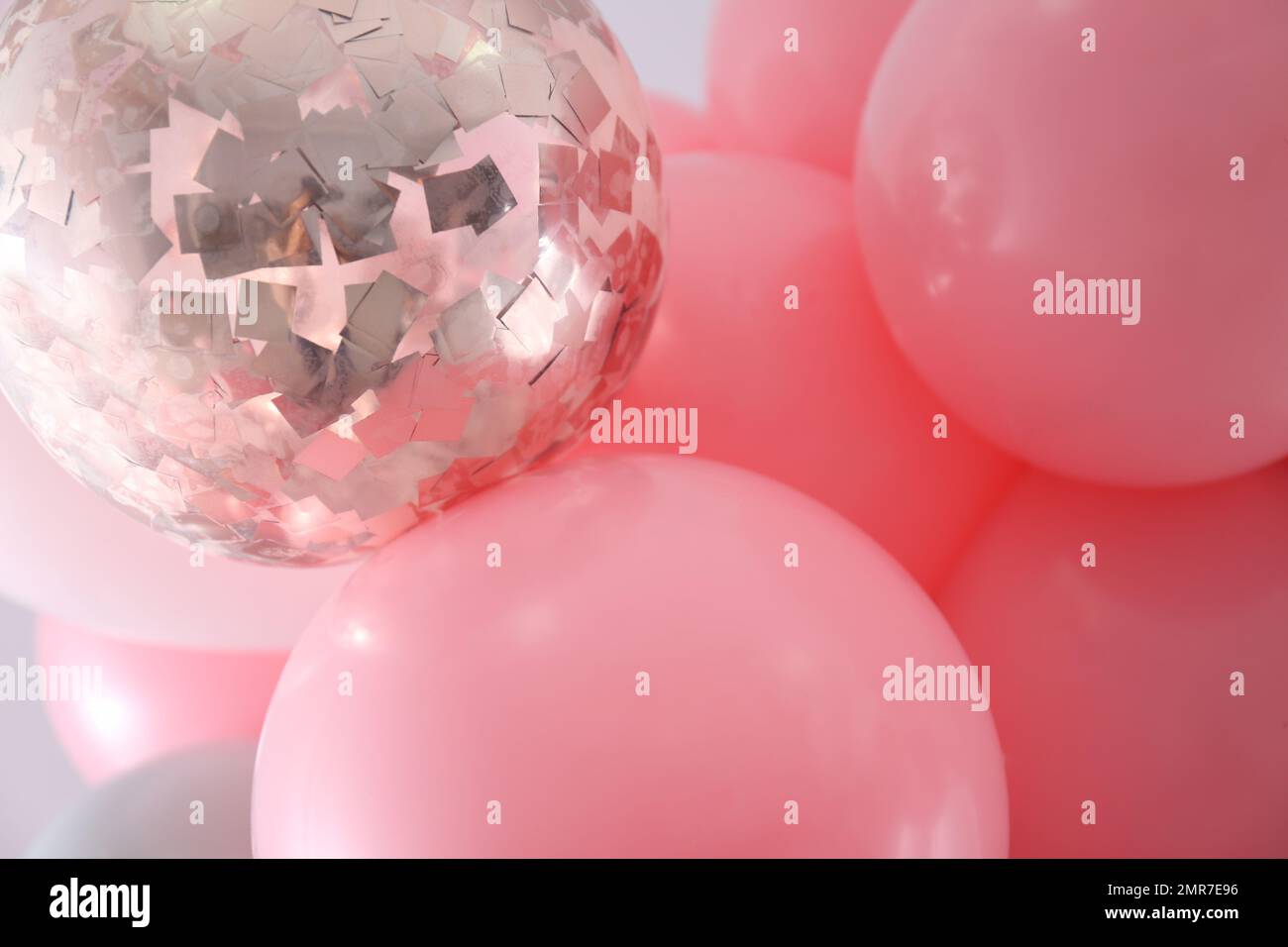 Beautiful colorful balloons on light background, closeup Stock Photo ...