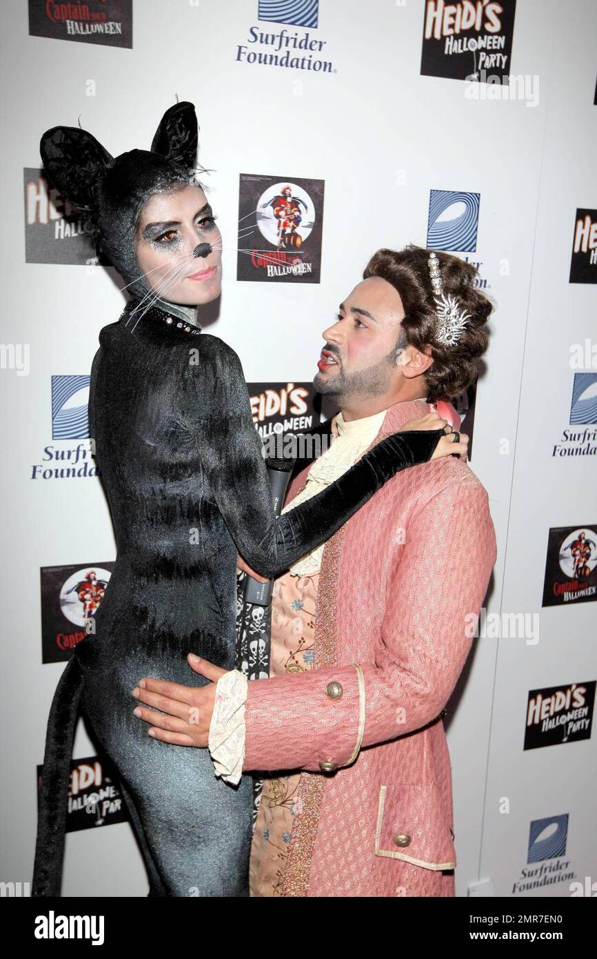 Heidi Klum in a cat costume hosts her Halloween party at the Green Door ...