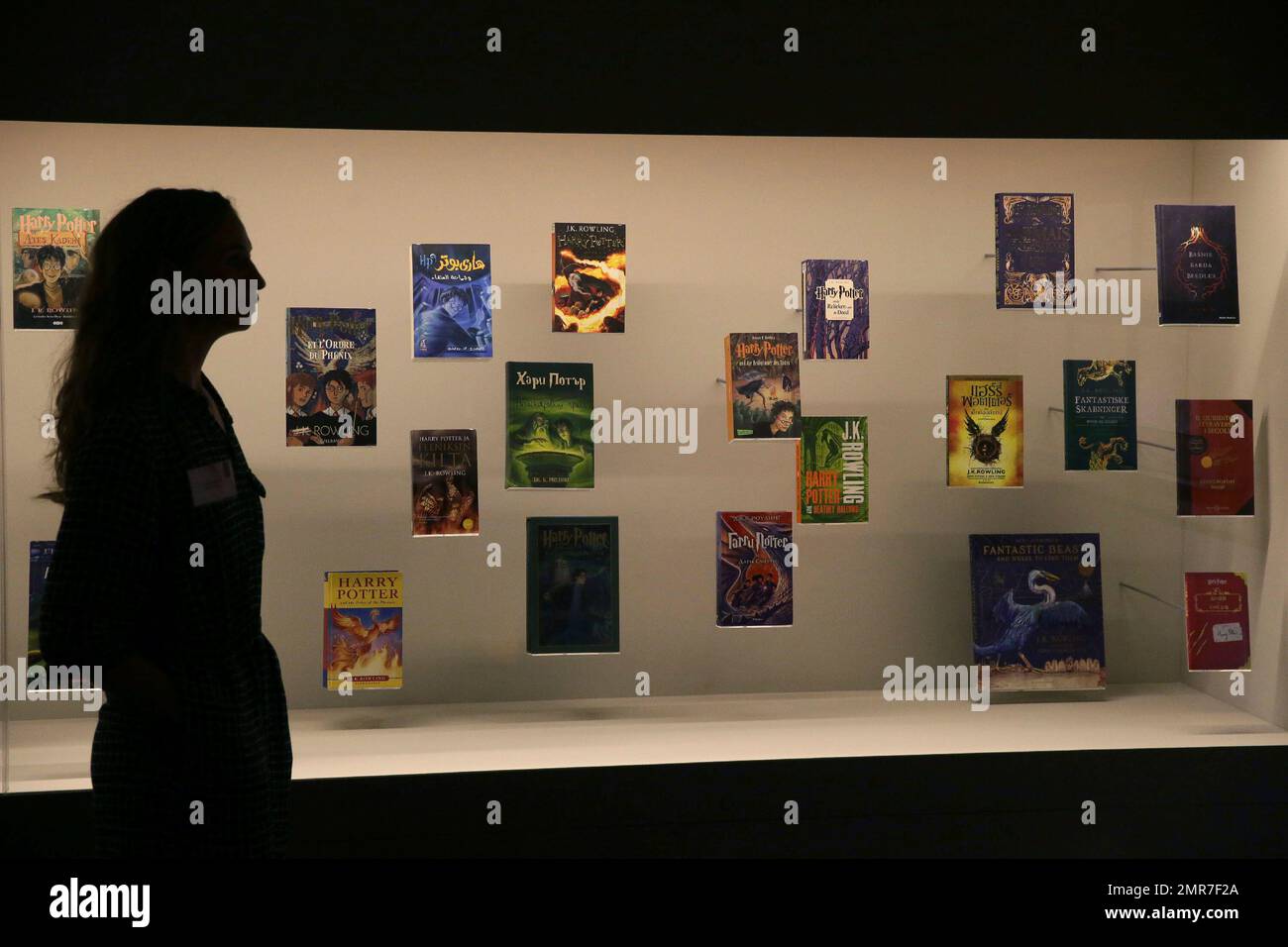 A member of British Library staff poses for a picture with Harry Potter ...