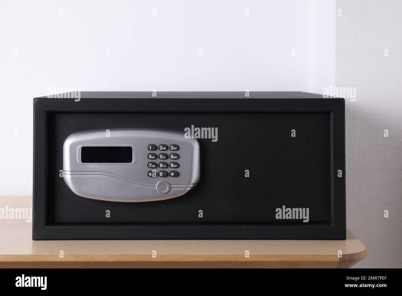 Modern safe on table hi-res stock photography and images - Alamy