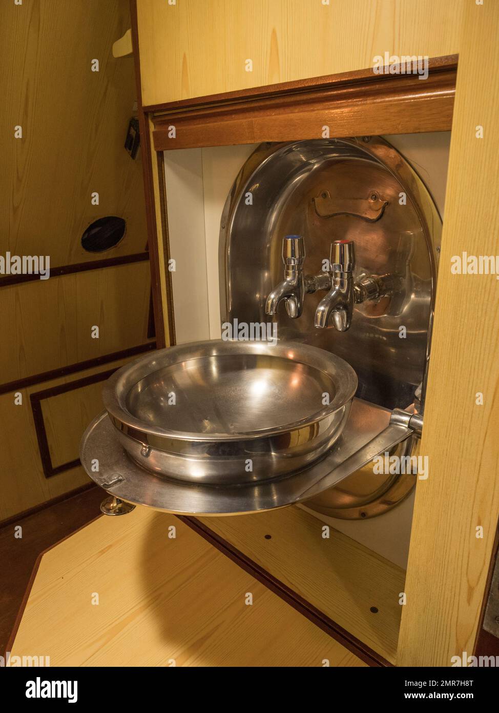 Wash basin inside HMS Ocelot in the Historic Dockyard Chatham, Kent, UK ...