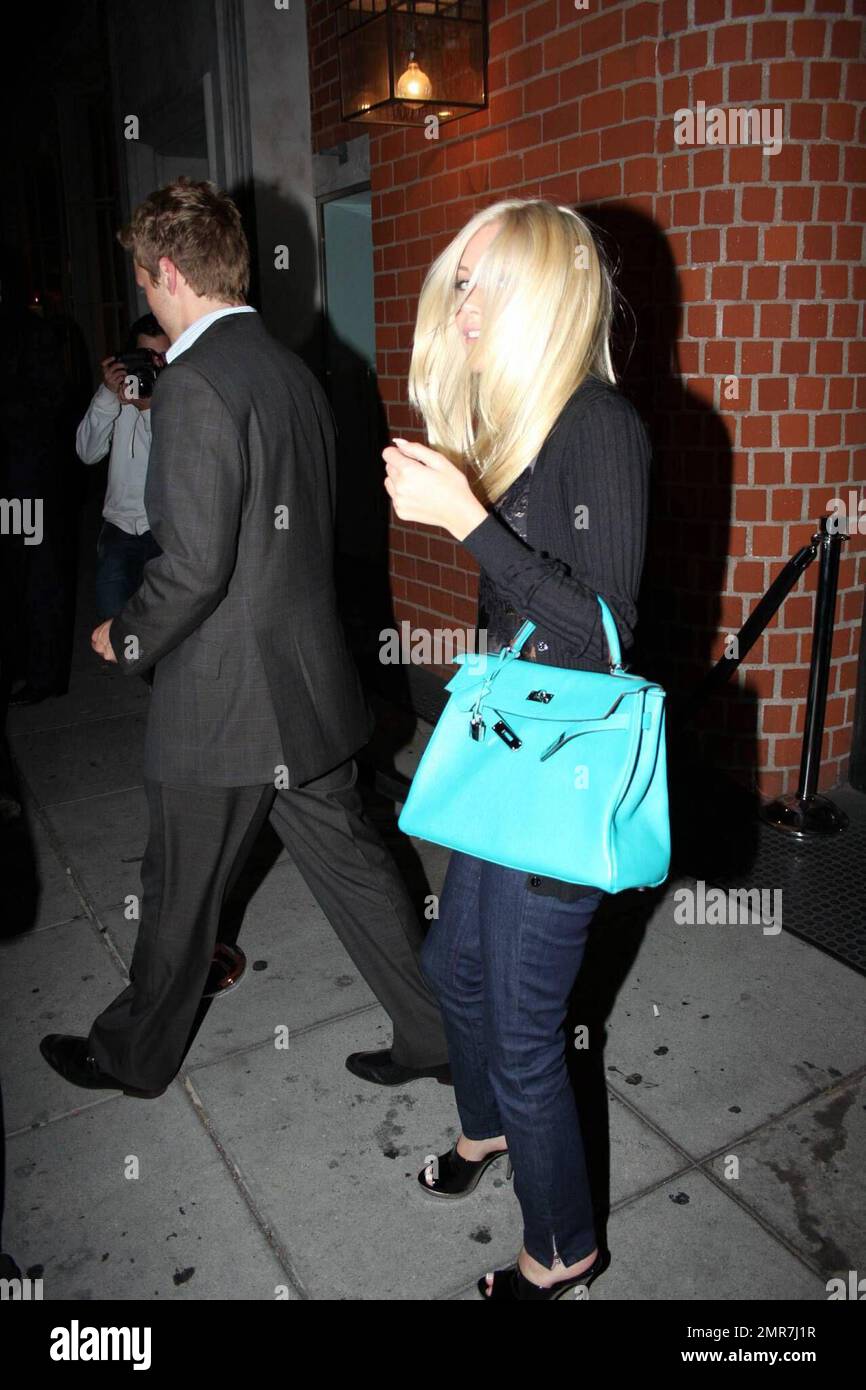 Heidi Montag signs autographs, including one for a soldier, as she and ...