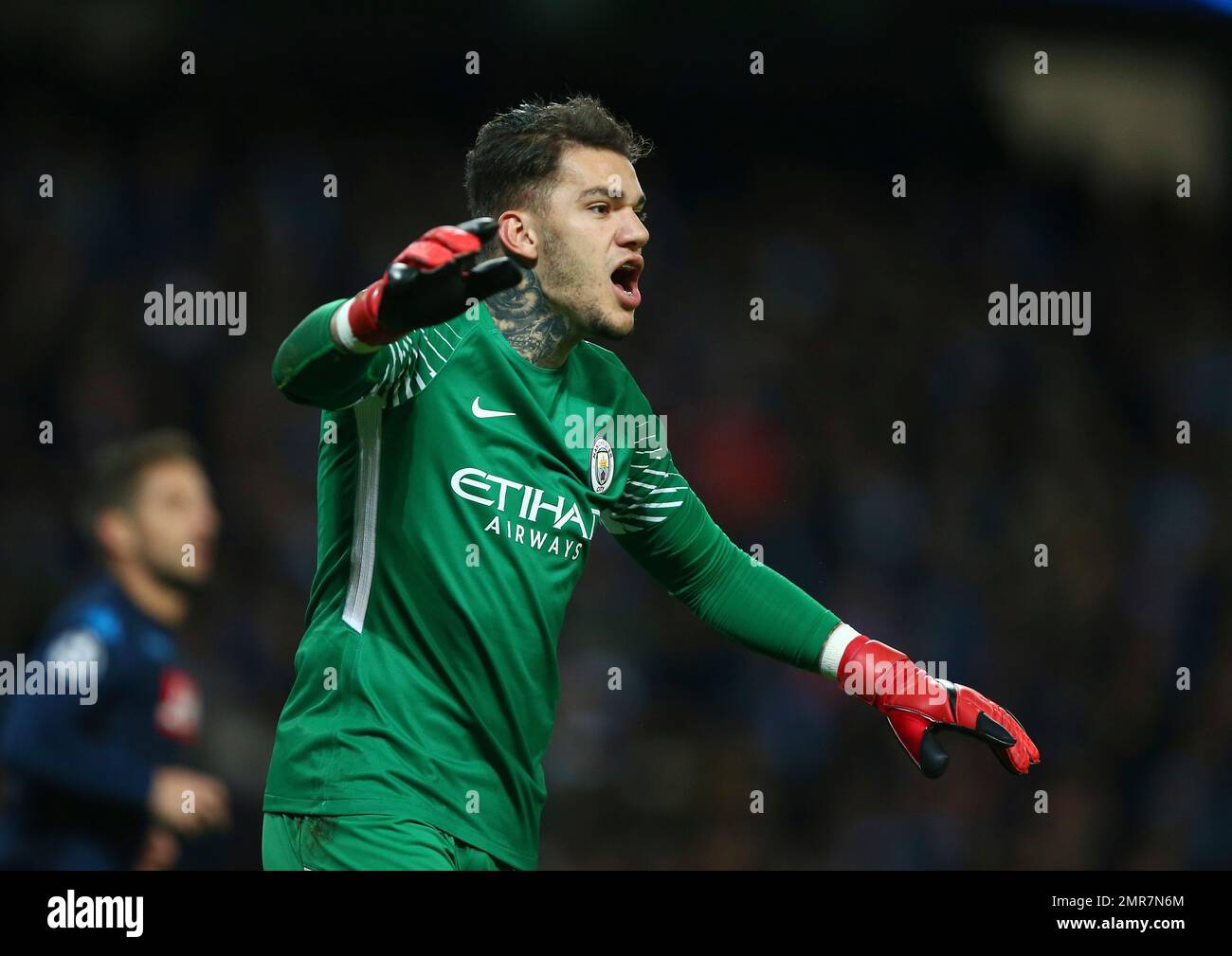 Manchester City goalkeeper Ederson celebrates after saving a penalty ...