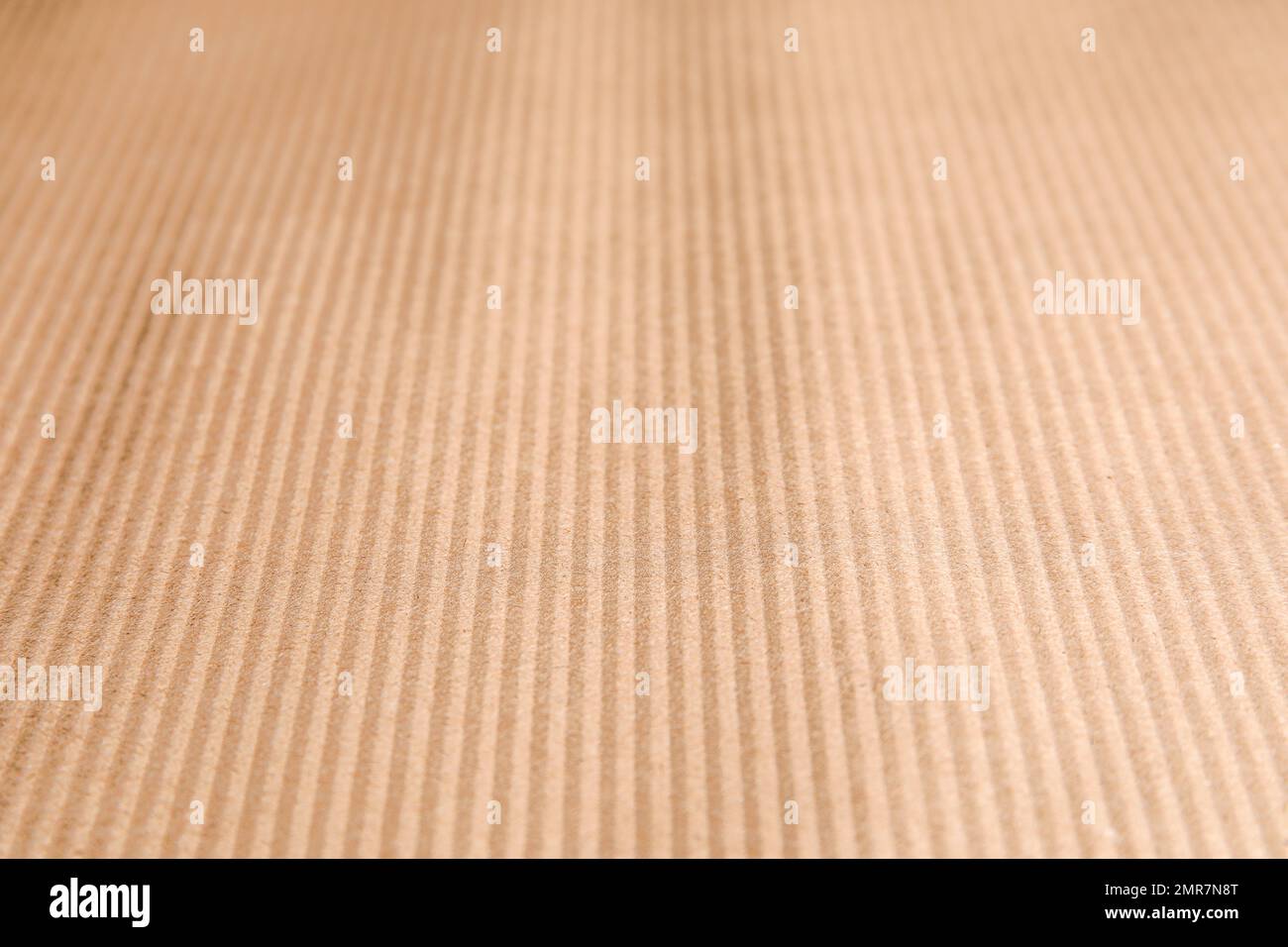 Brown corrugated sheet of cardboard as background, closeup Stock Photo ...