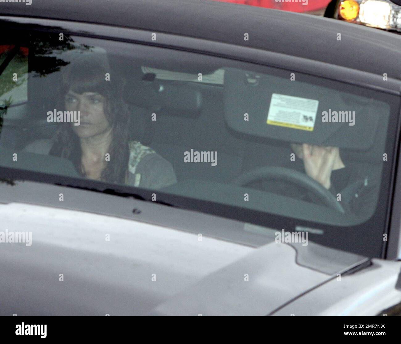 Helena Christensen not looking her best as she catches a ride with ...