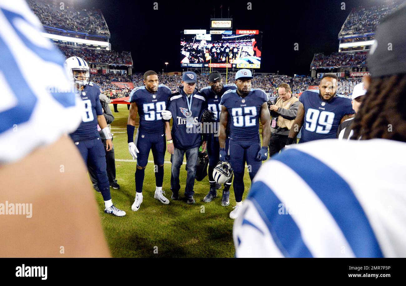 Tennessee Titans players Wesley Woodyard (59), Delanie Walker (82) and ...