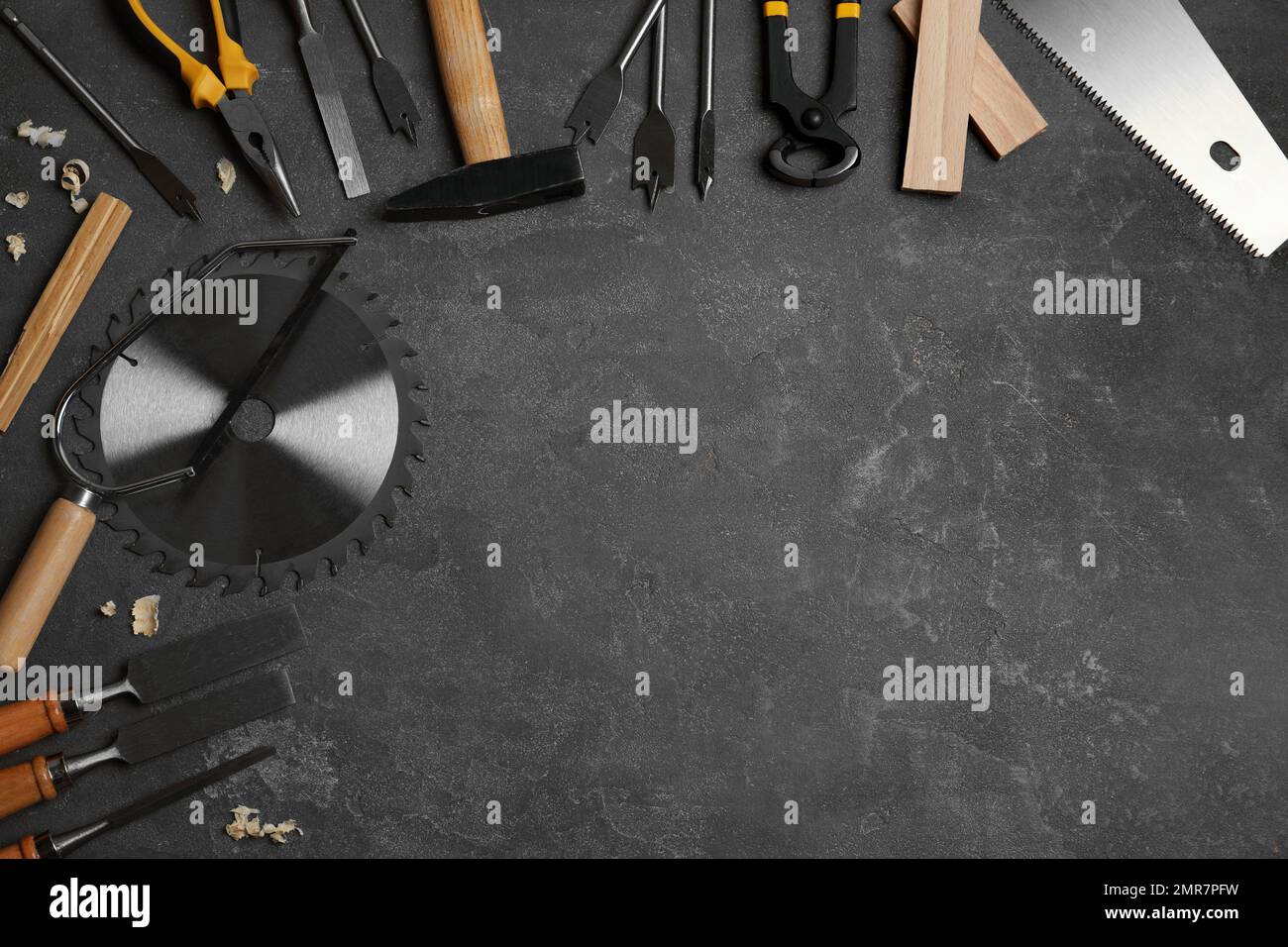 Flat lay composition with carpenter's tools on grey background. Space ...