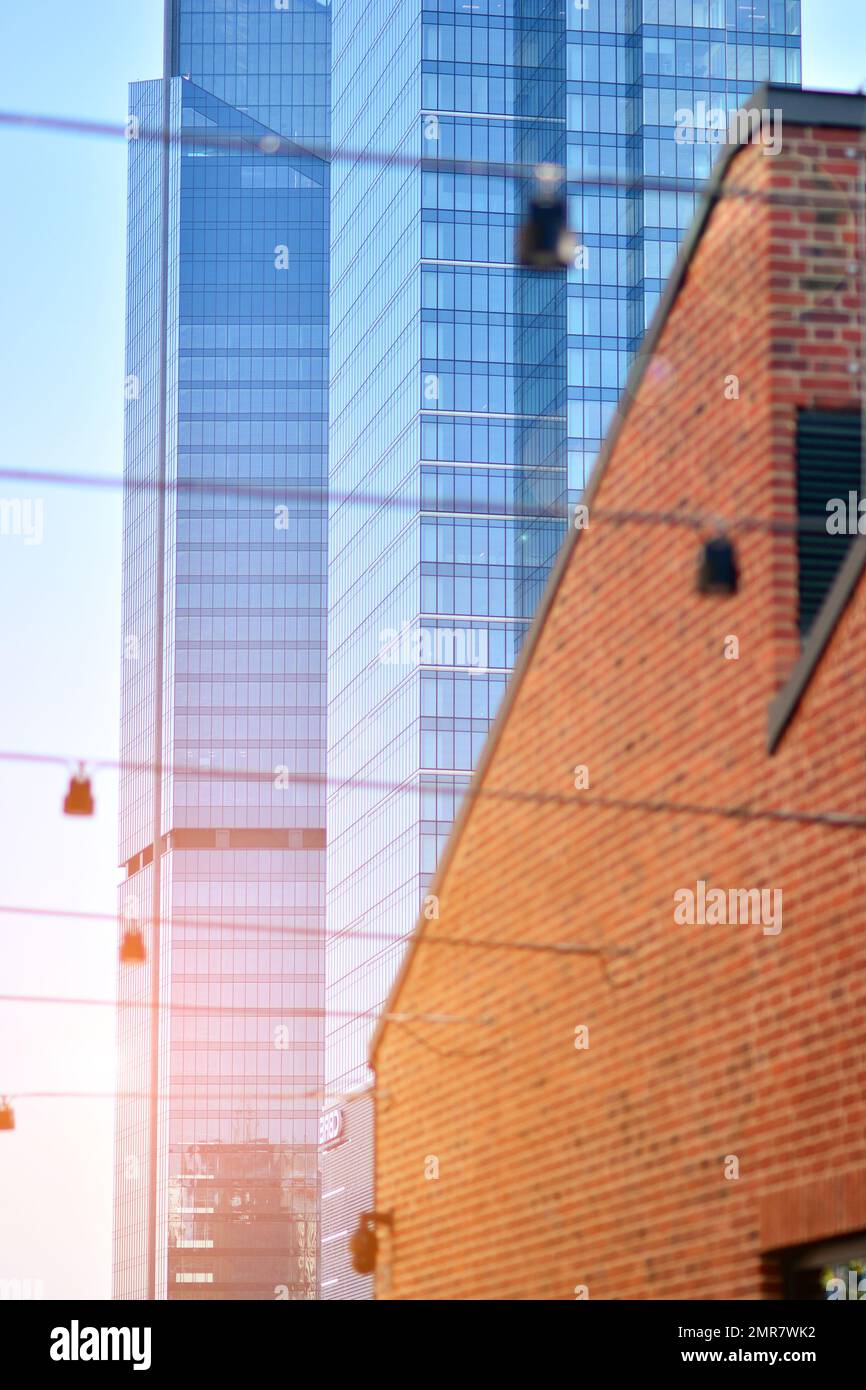 Abstract closeup of the glass-clad facade of a modern building covered ...
