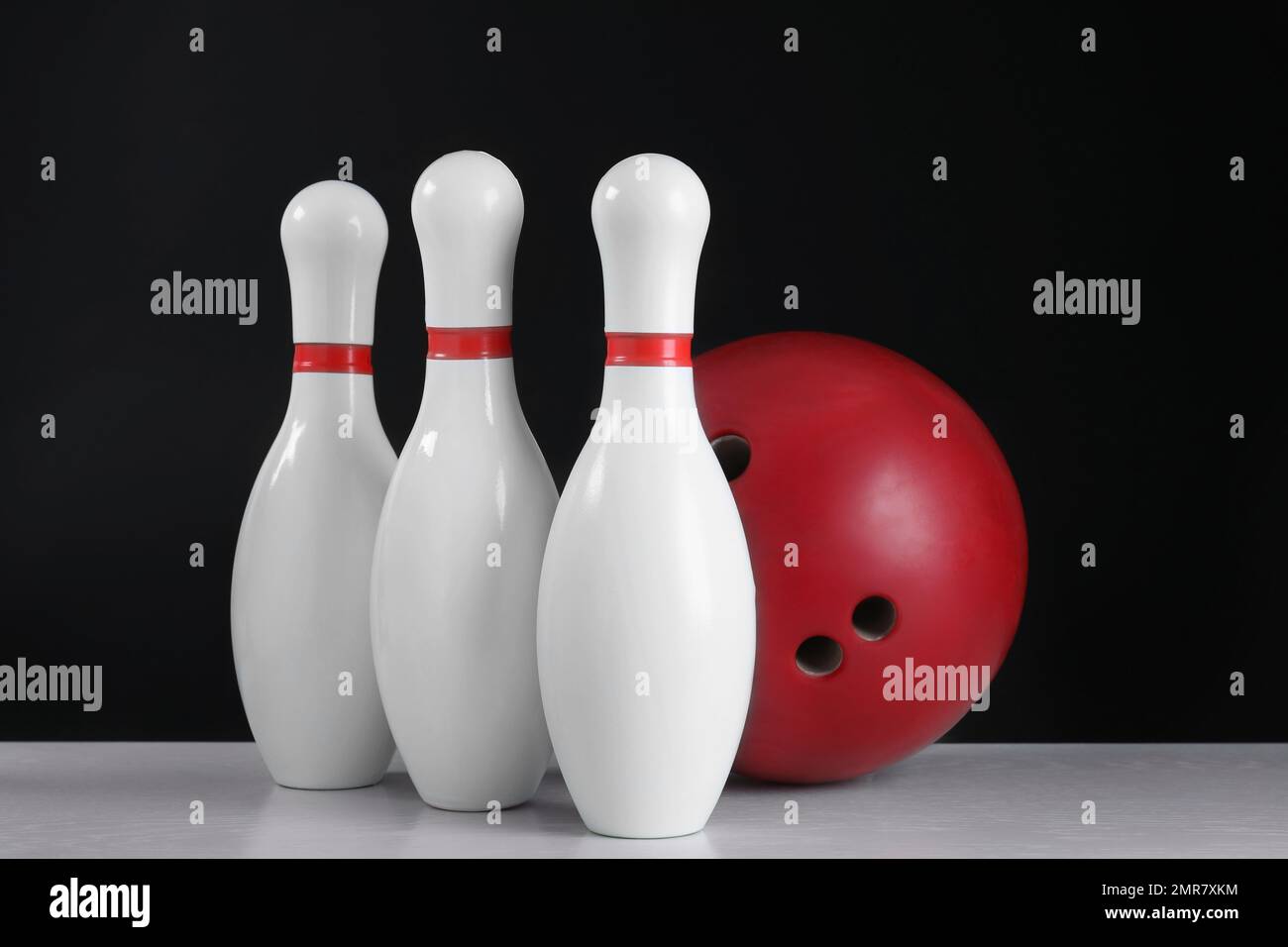 Bowling pins on grey hi-res stock photography and images - Alamy