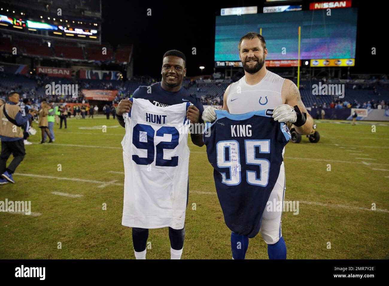 Tennessee Titans defensive end David King, left, and Indianapolis Colts ...