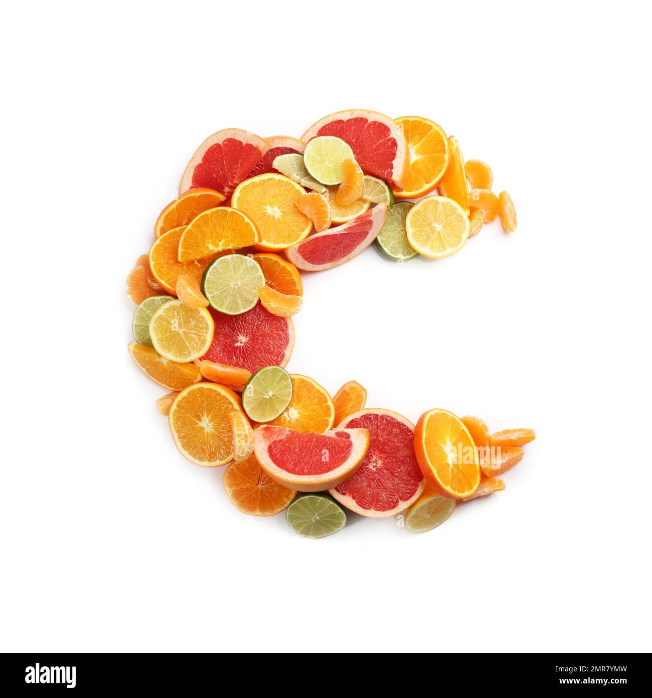 Letter C made with citrus fruits on white background as vitamin ...