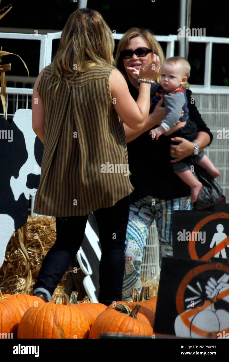 Hilary Duff along with husband Mike Comrie and son Luca Cruz Comrie ...