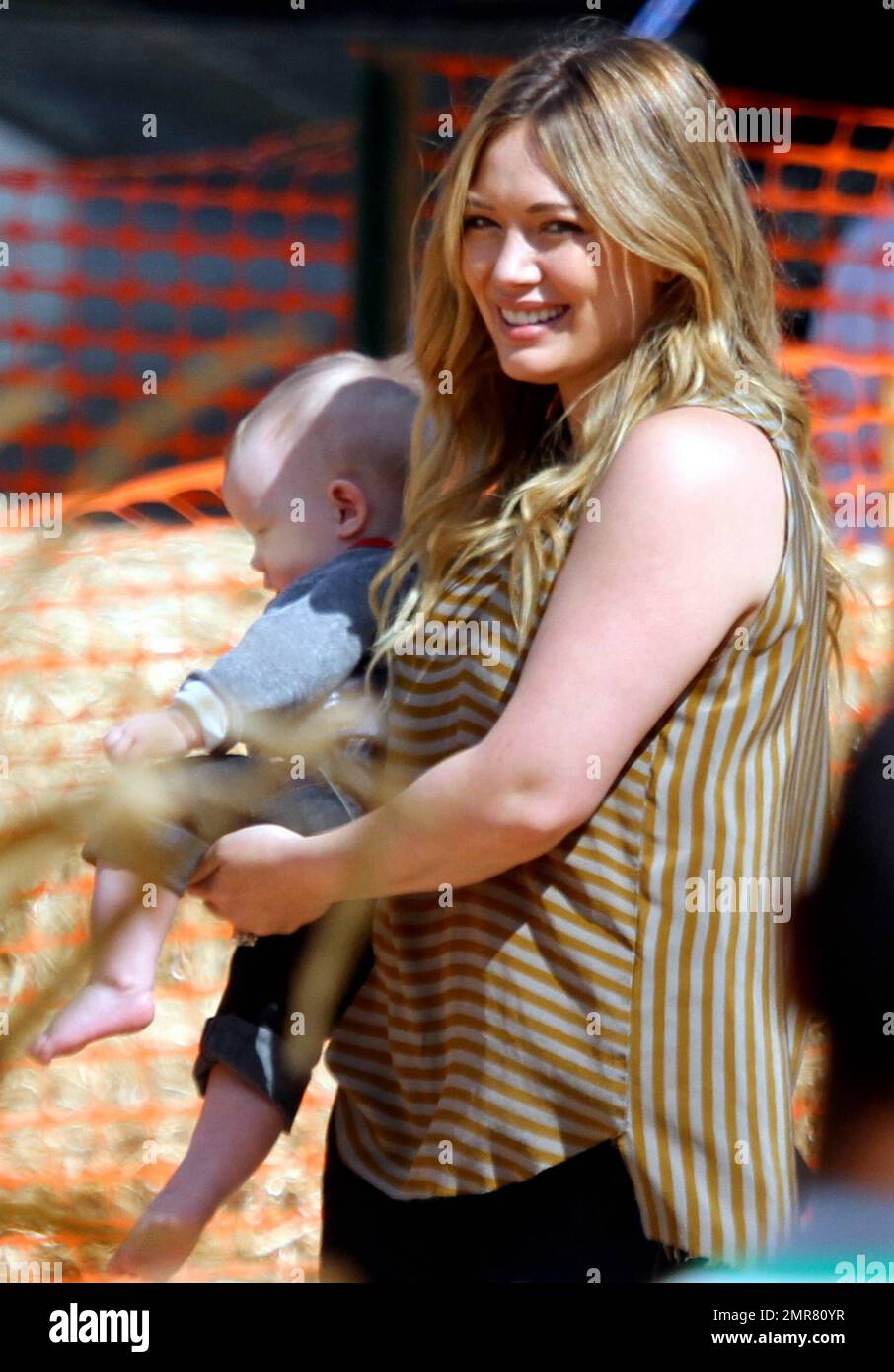 Hilary Duff along with husband Mike Comrie and son Luca Cruz Comrie ...