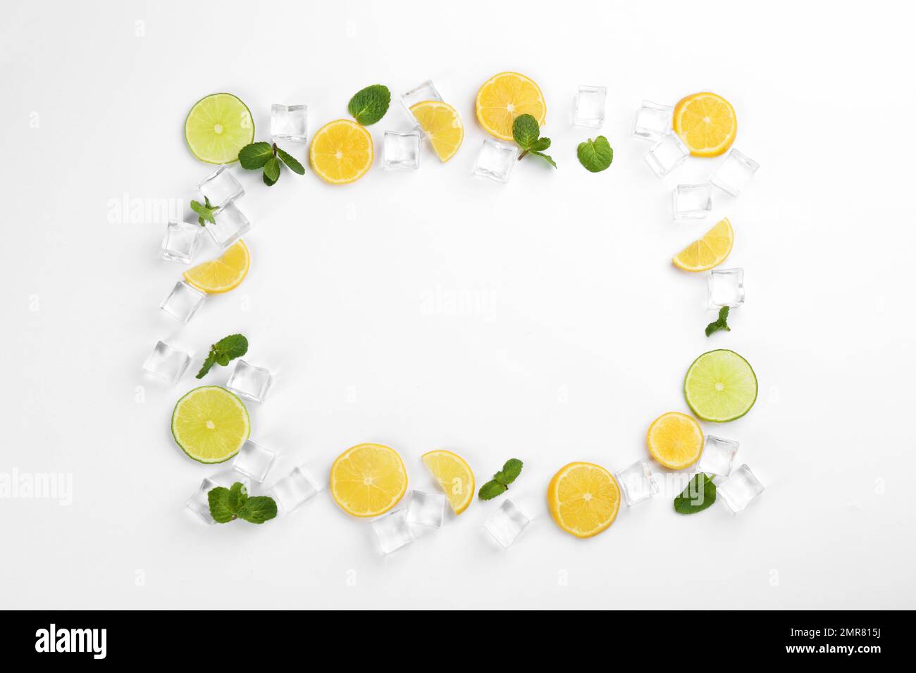 Frame made with ingredients for lemonade on white background, top view ...