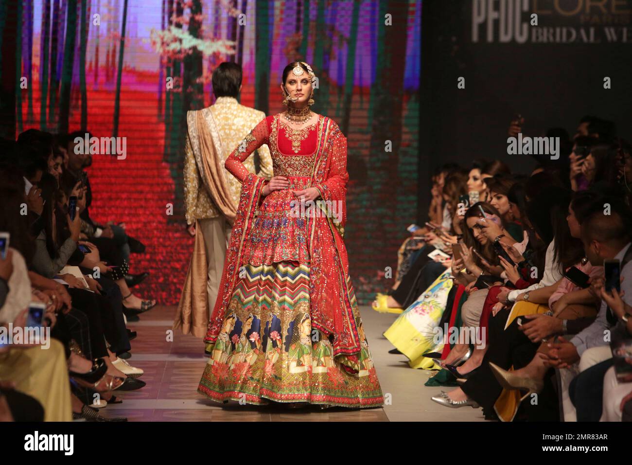 A model presents a creation of designer Nomi Ansari during the Bridal ...