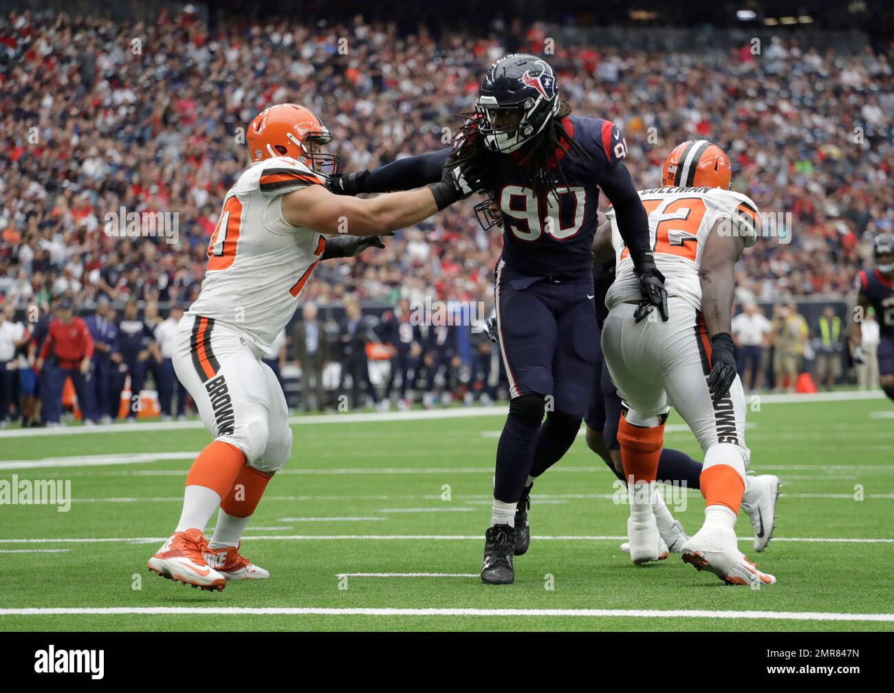 Houston Texans defensive end Jadeveon Clowney (90) charges against ...