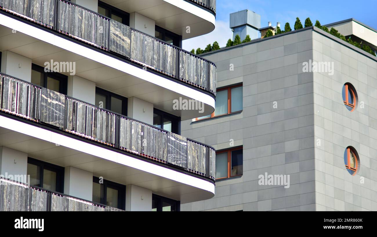 Futuristic square architecture of apartment building. Real estate with ...