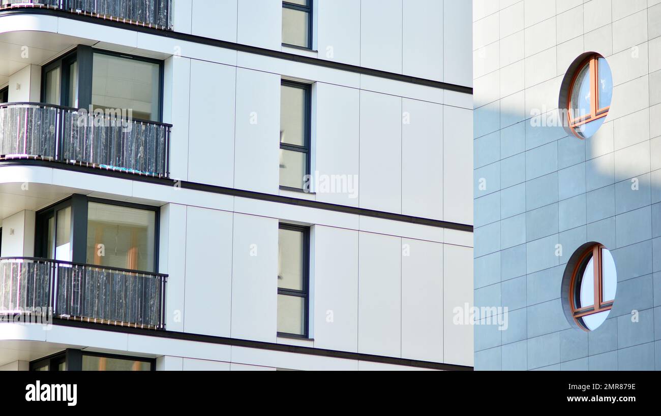 Futuristic square architecture of apartment building. Real estate with ...