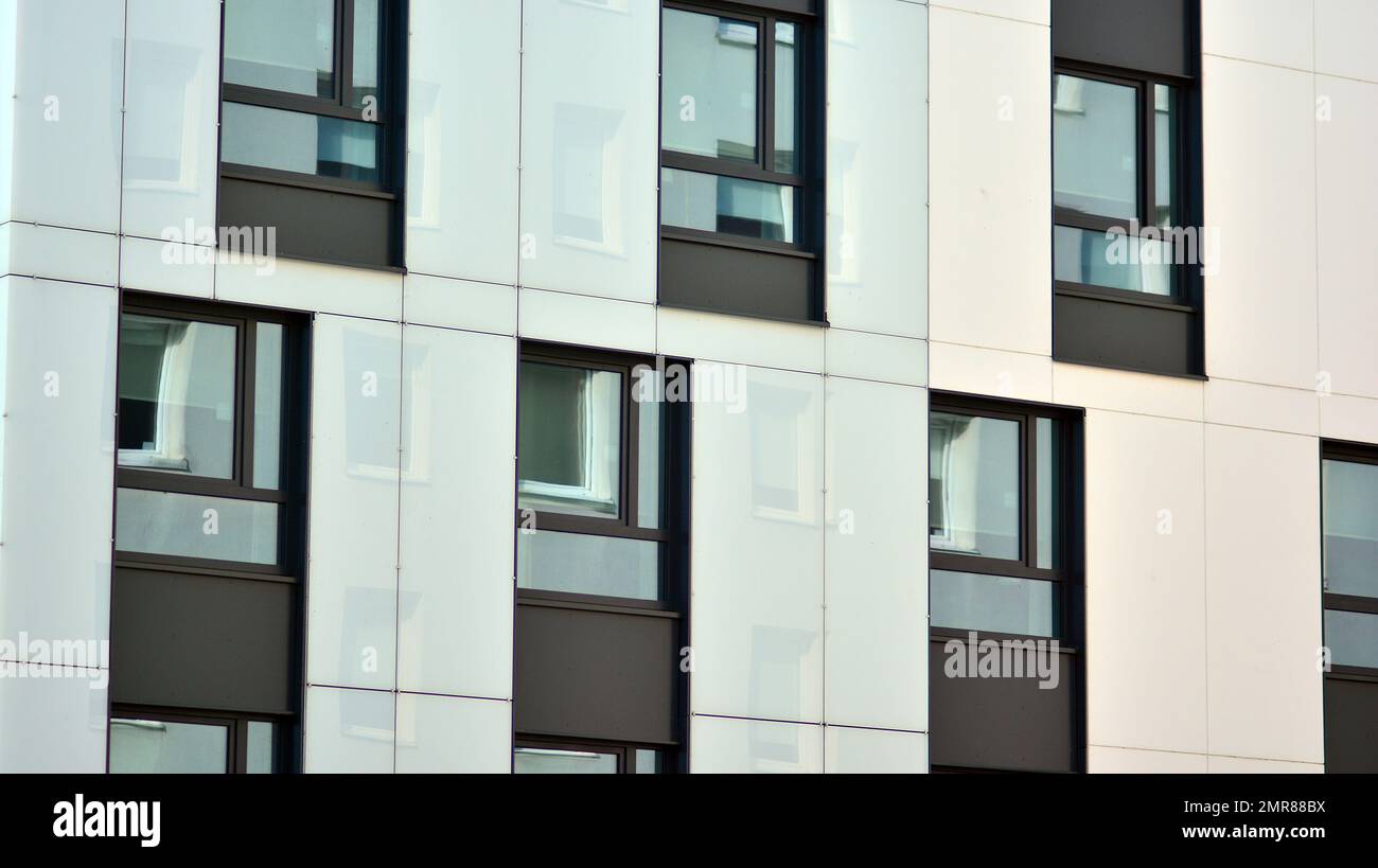 Futuristic square architecture of apartment building. Real estate with ...