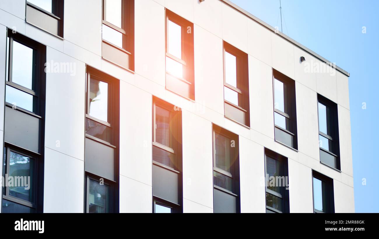 Futuristic square architecture of apartment building. Real estate with ...