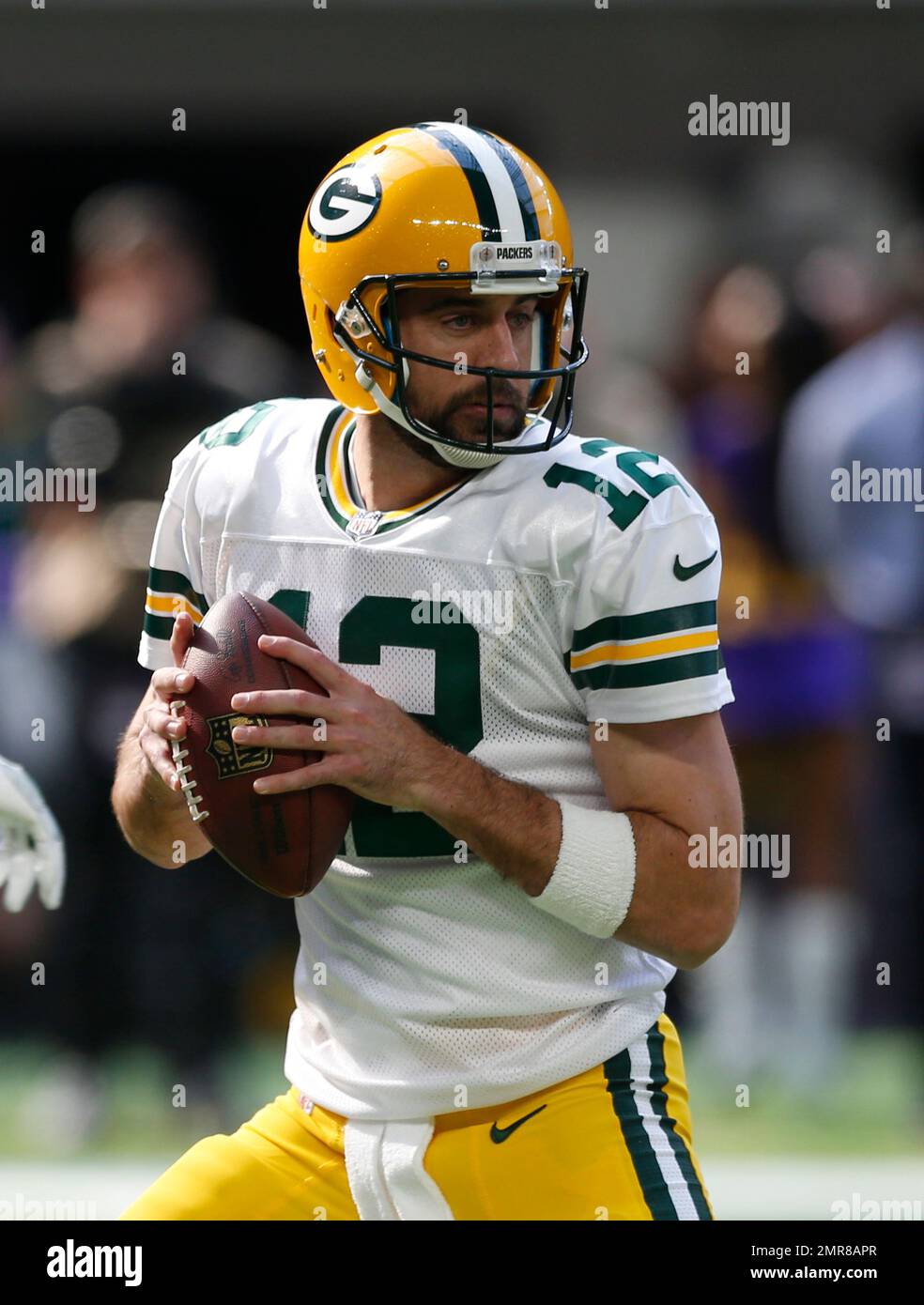Green Bay Packers quarterback Aaron Rodgers (12) looks to pass ...