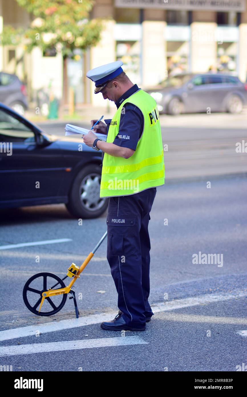 Car crash accident. A traffic policeman during an action Stock Photo ...