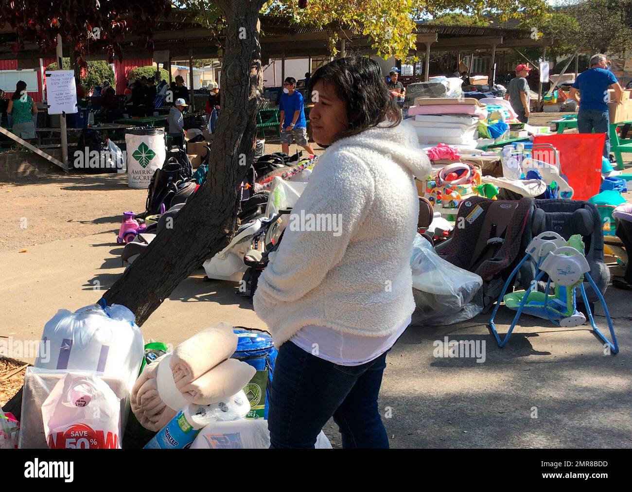 Jennifer Jauregui, the daughter of a local grape picker, stands at the ...