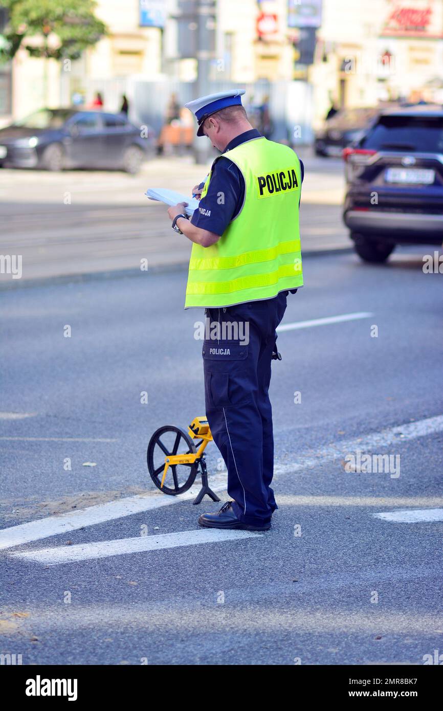 Car crash accident. A traffic policeman during an action Stock Photo ...