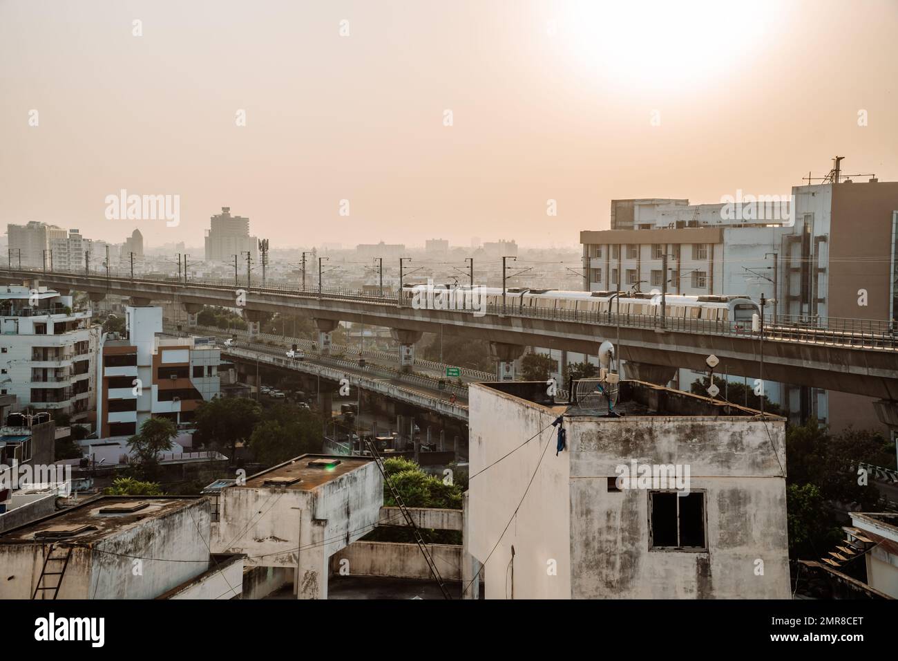A bird's-eye view of a train bridge in the cityscape of Jaipur, India ...