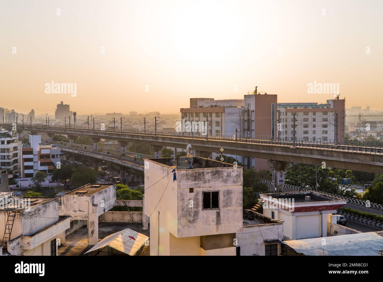 A bird's-eye view of a train bridge in the cityscape of Jaipur, India ...
