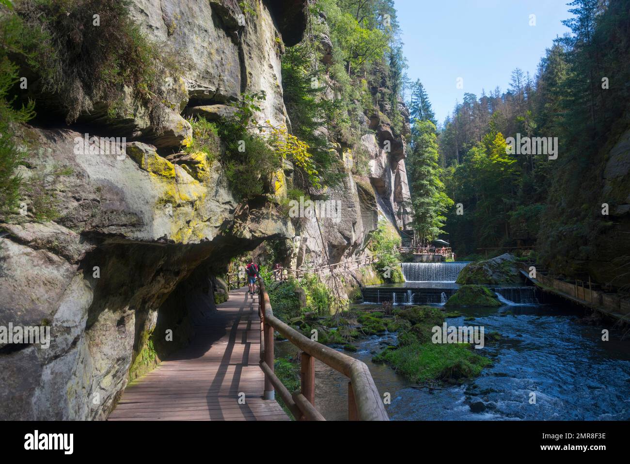 Footbridge and waterfalls in the Edmundsklamm, Kamenice River, Kamnitz ...