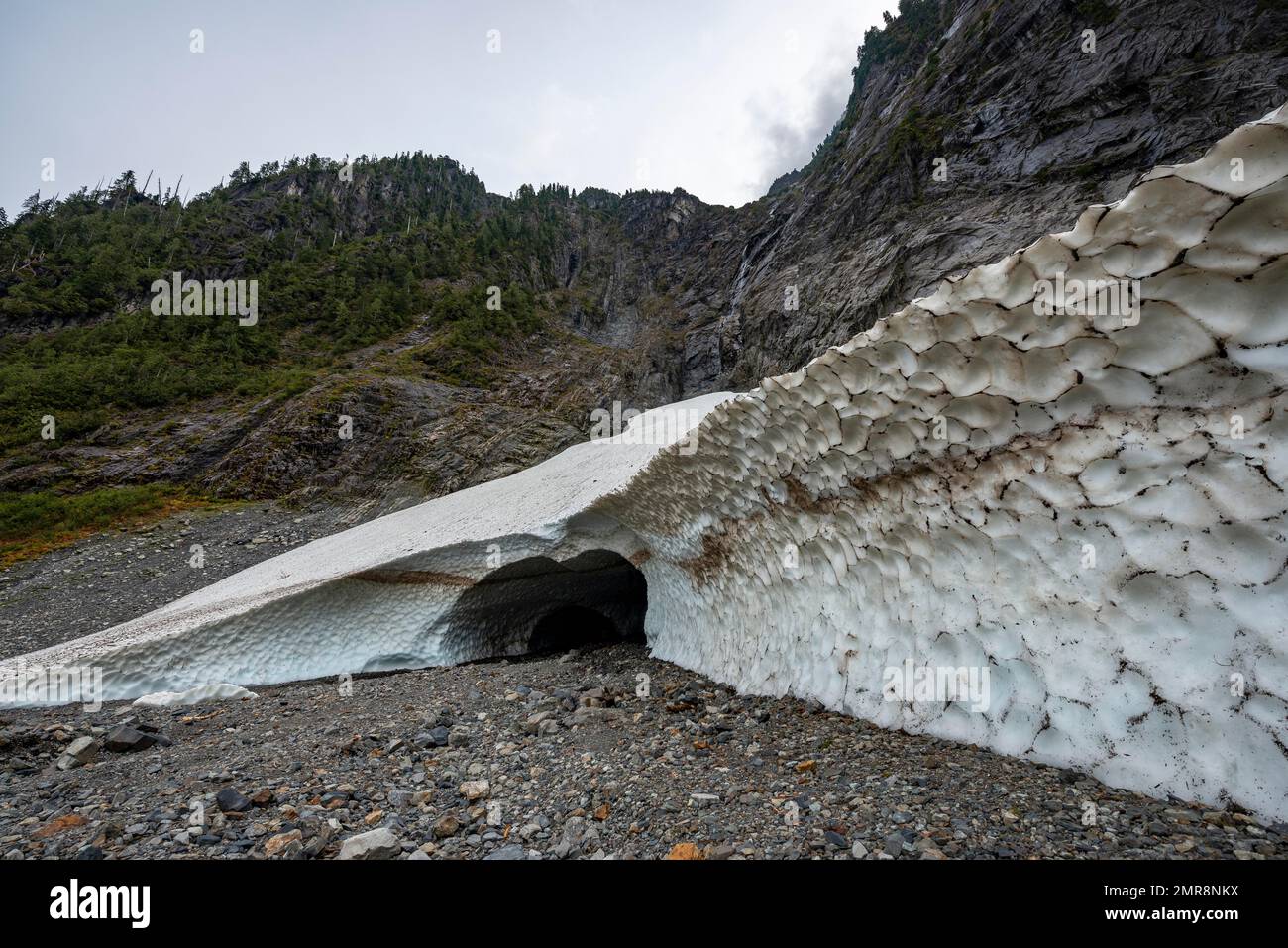 Entrance of an ice cave of a glacier, Big Four Ice Caves, Okanogan ...
