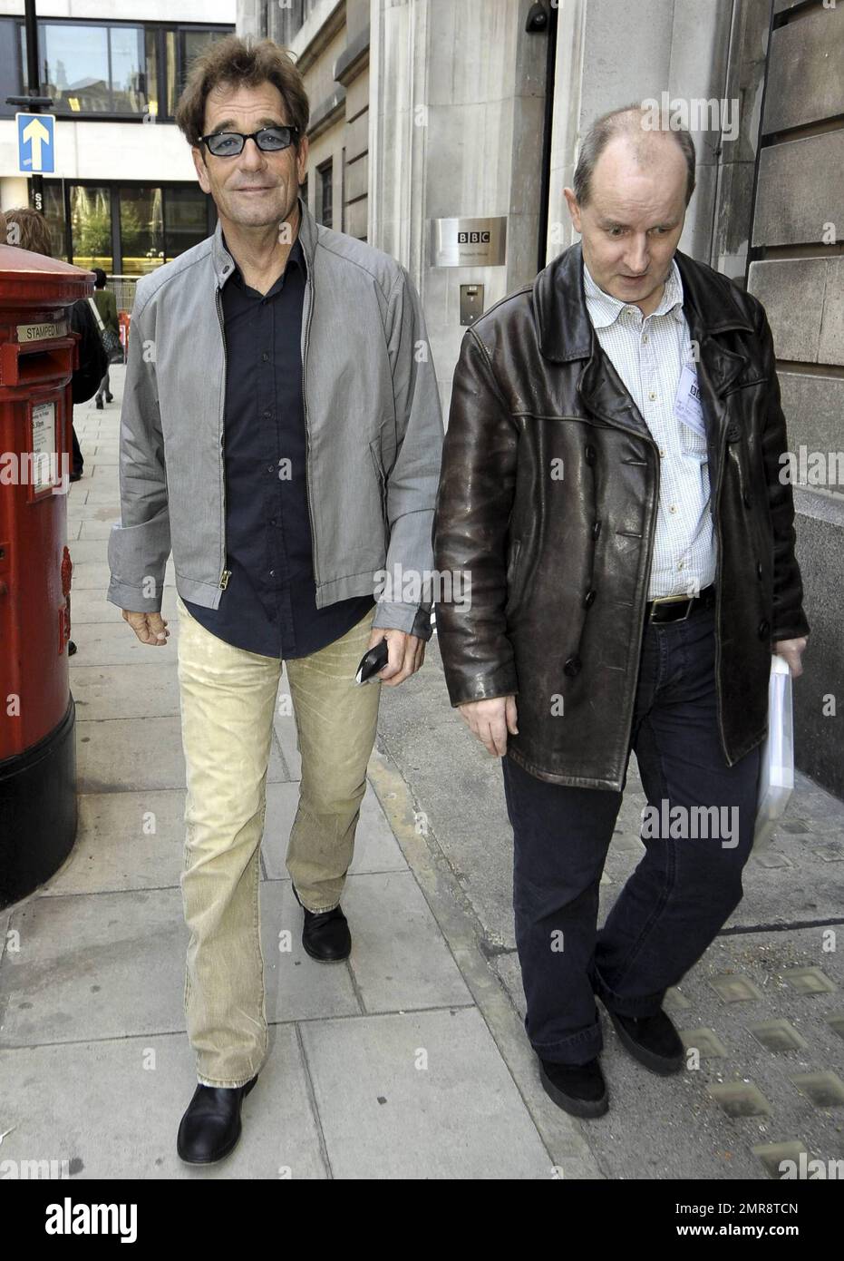 Singer Huey Lewis poses for photos outside BBC Radio 2. The Grammy ...