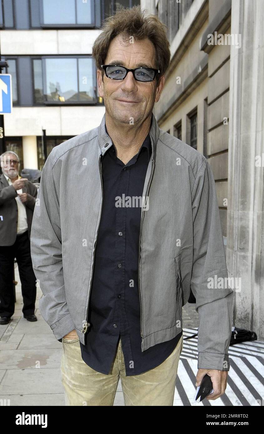 Singer Huey Lewis poses for photos outside BBC Radio 2. The Grammy ...