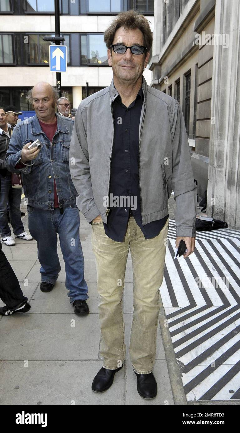 Singer Huey Lewis poses for photos outside BBC Radio 2. The Grammy ...