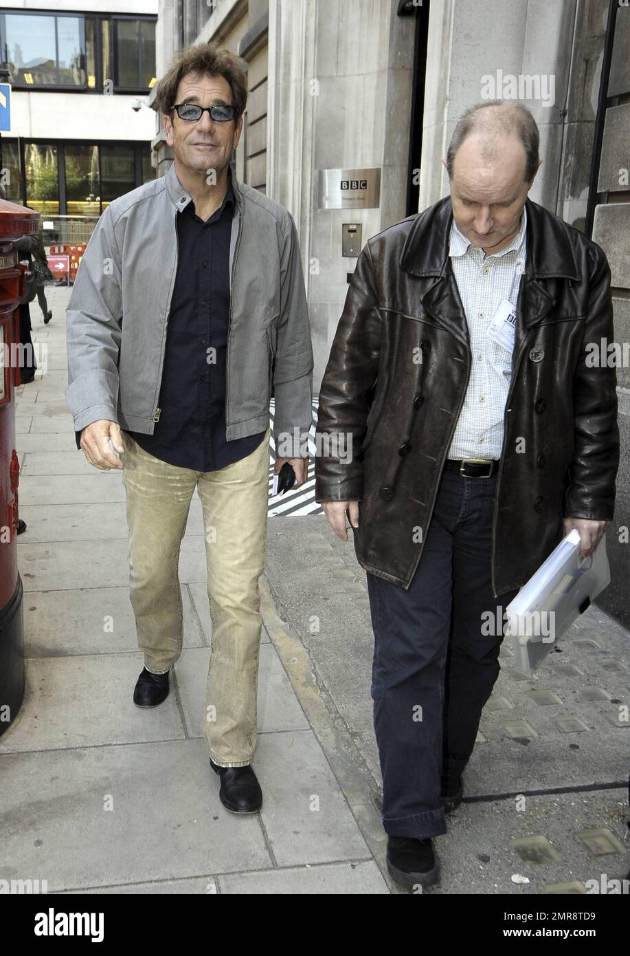 Singer Huey Lewis poses for photos outside BBC Radio 2. The Grammy ...