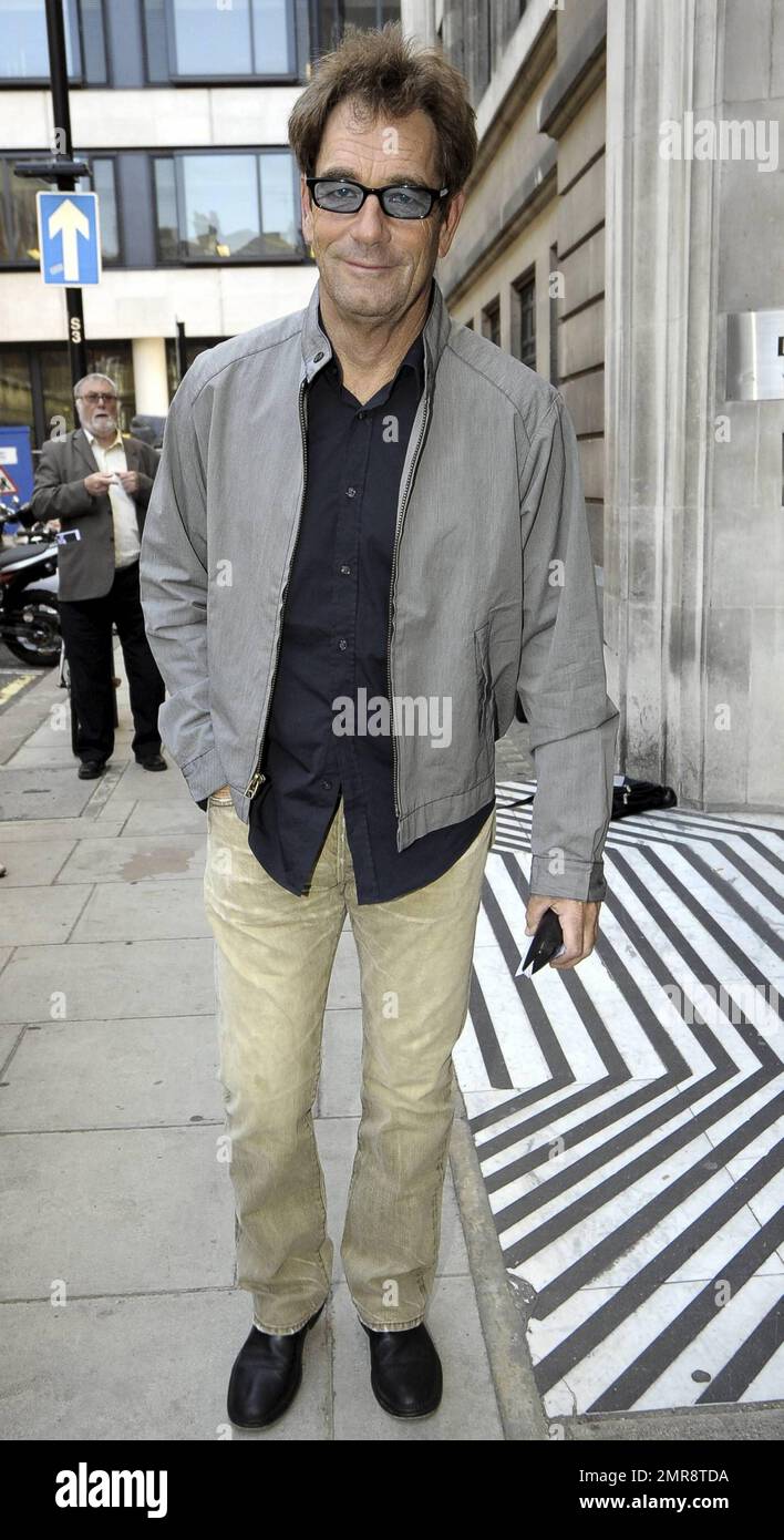 Singer Huey Lewis poses for photos outside BBC Radio 2. The Grammy ...