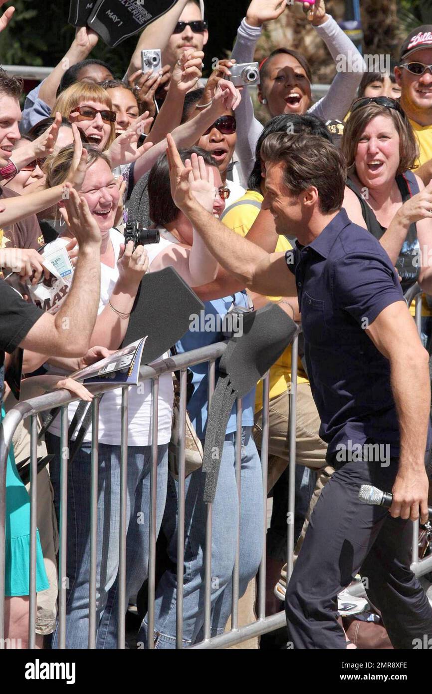 Hugh Jackman meets and signs autographs for scores of fans who were on ...