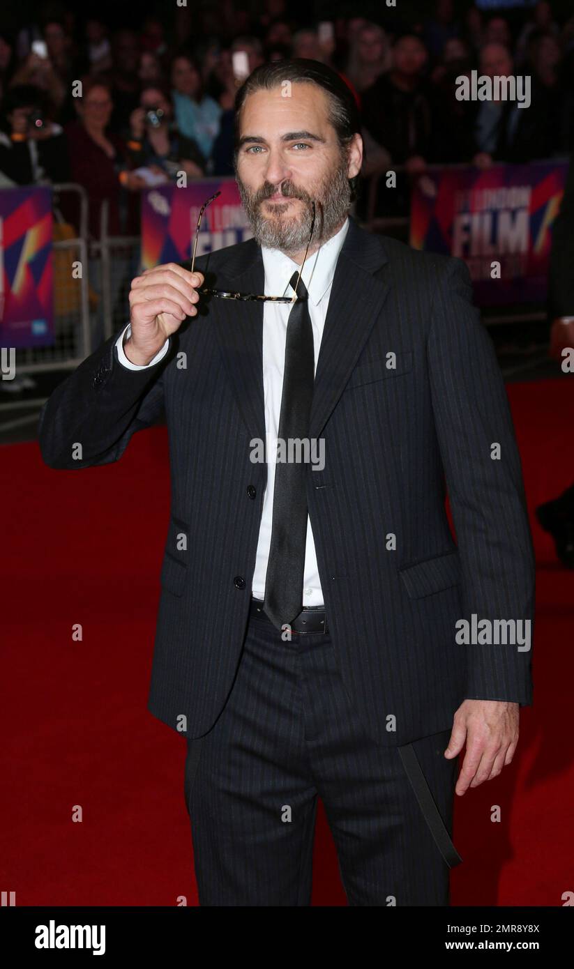 Actor Joaquin Phoenix poses for photographers upon arrival at the ...