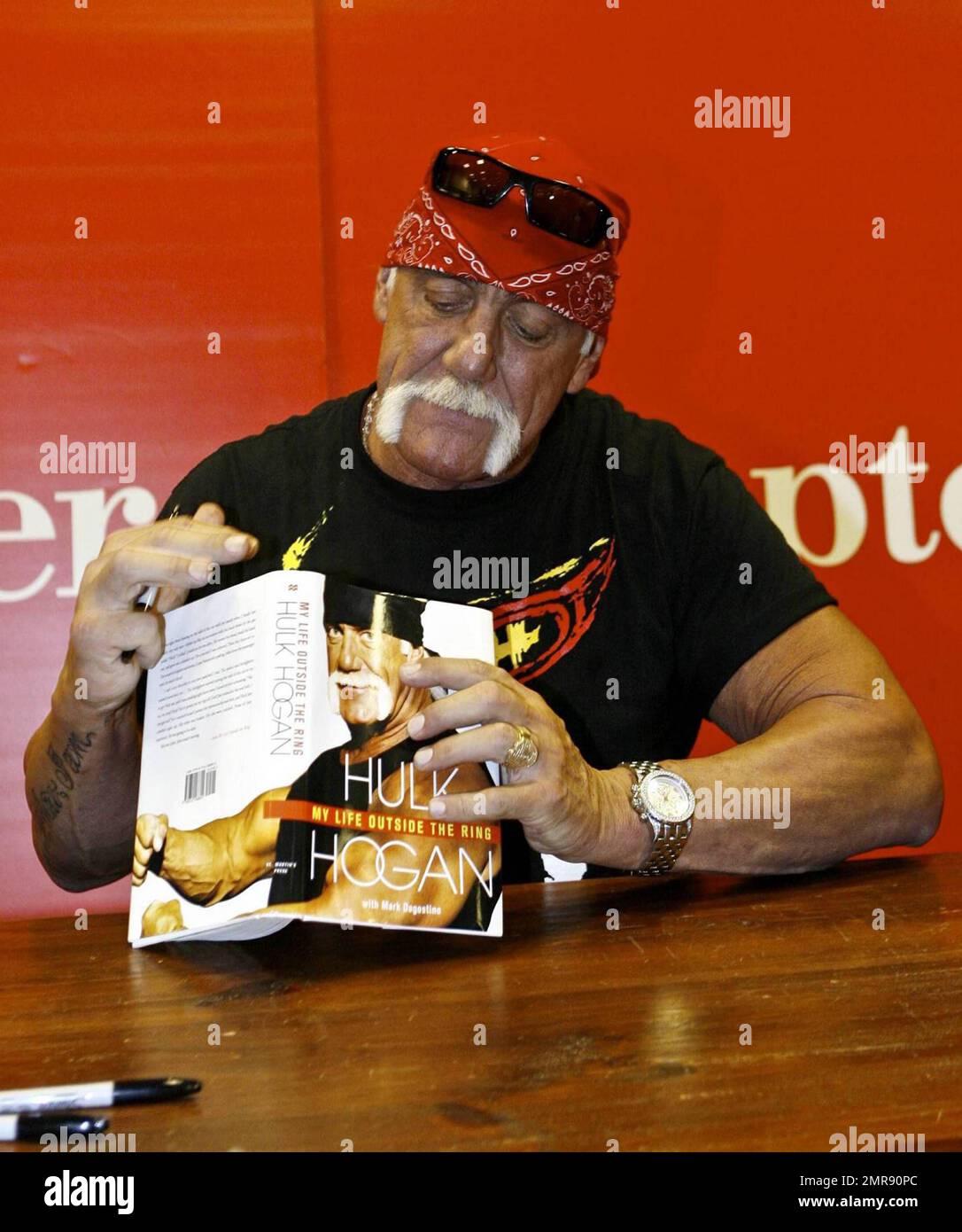 Hulk Hogan signs copies of his new book "Hulk Hogan: My Life Outside ...