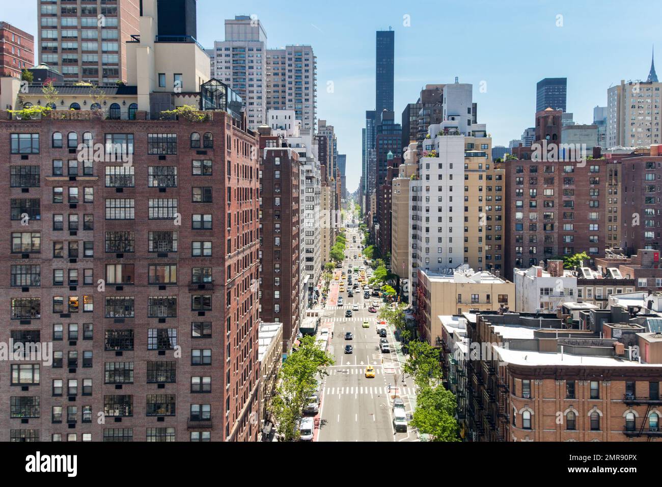 Overhead view First Avenue with traffic drivings through the buildings ...