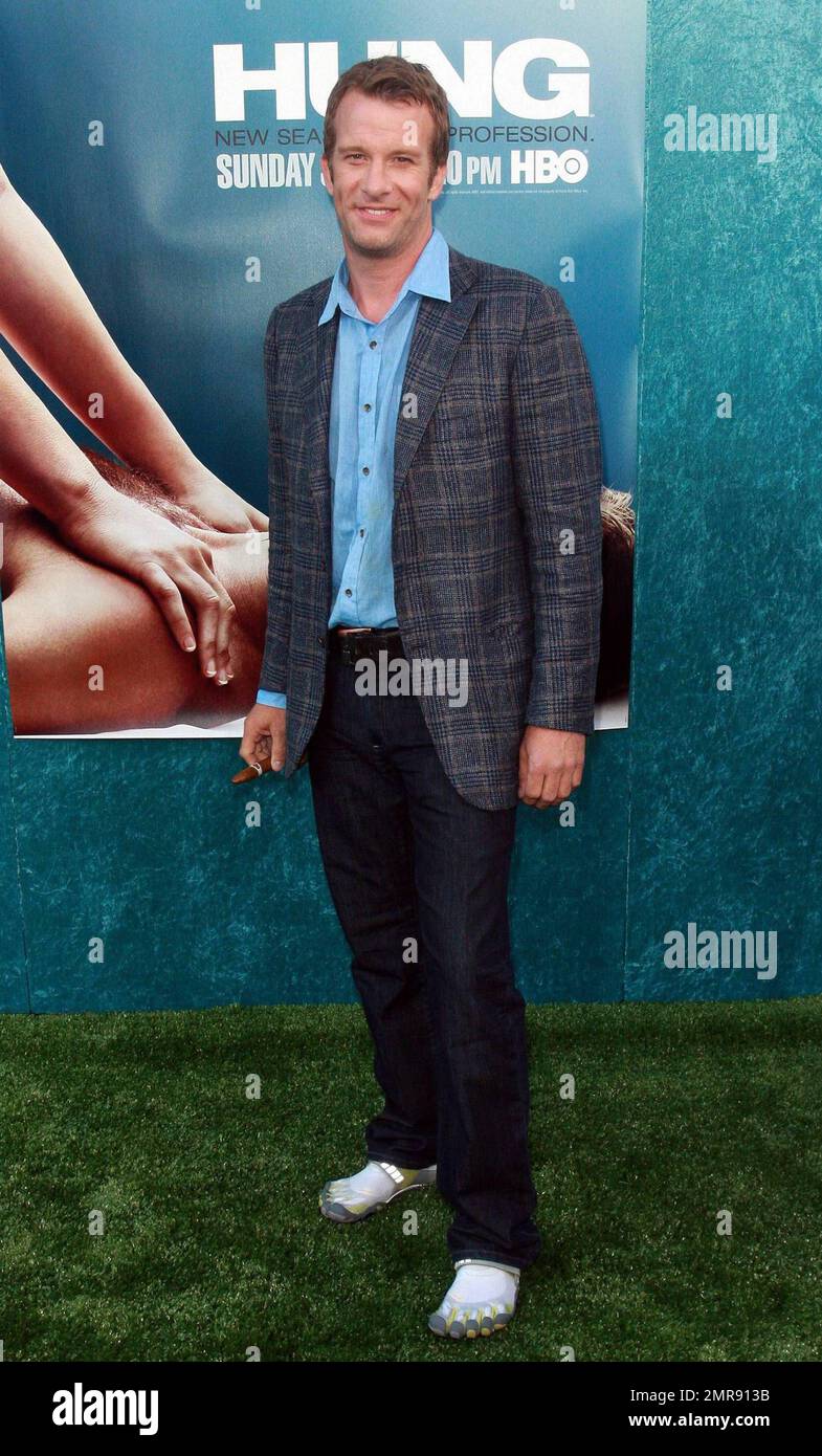 Actor Thomas Jane, wearing a pair of Vibram FiveFingers shoes, arrives ...