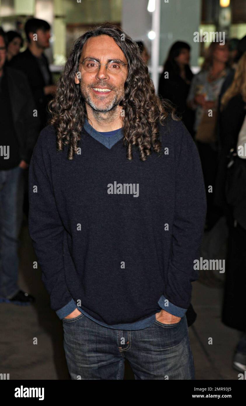 Tom Shadyac poses for photographers at the premiere of his documentary ...