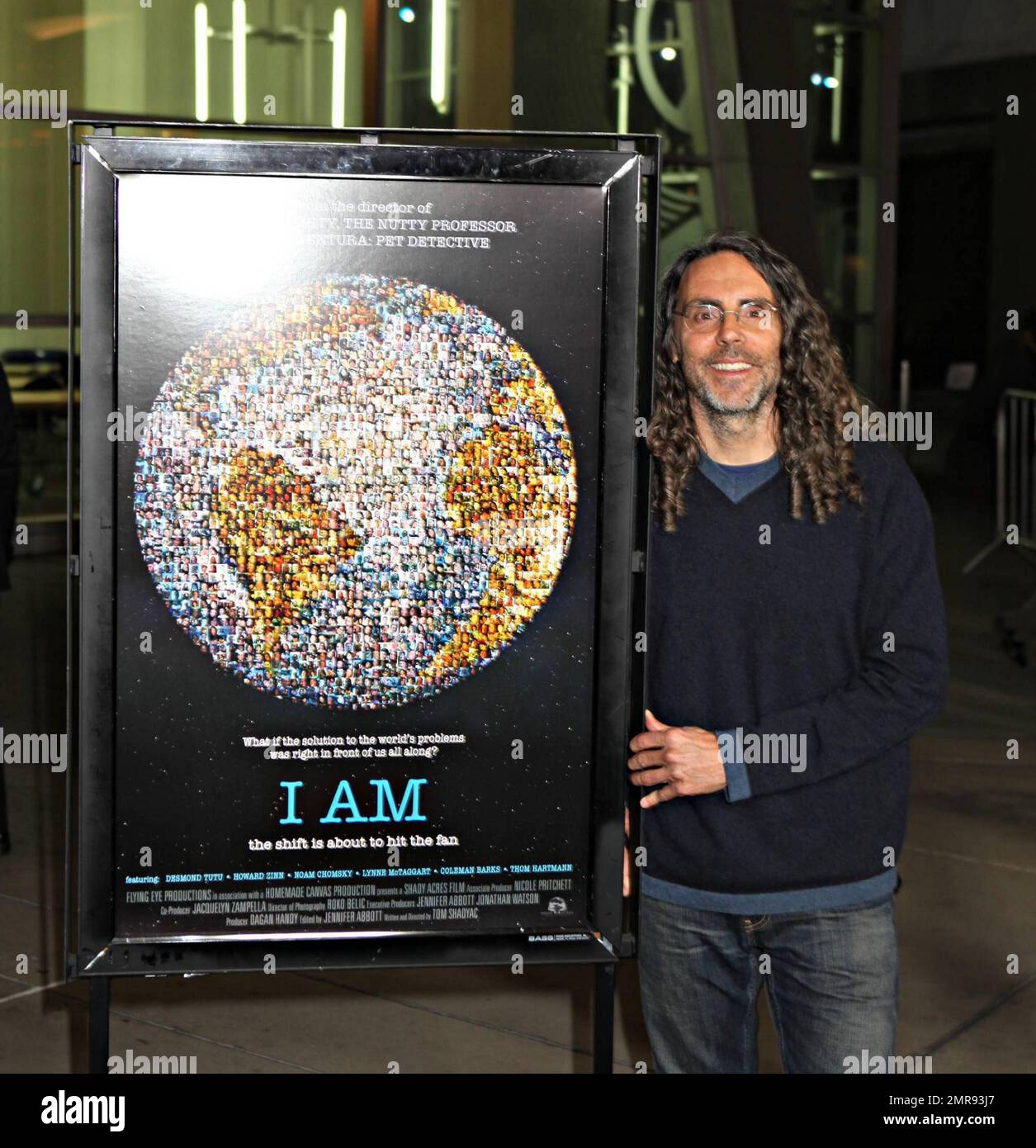 Tom Shadyac poses for photographers at the premiere of his documentary ...