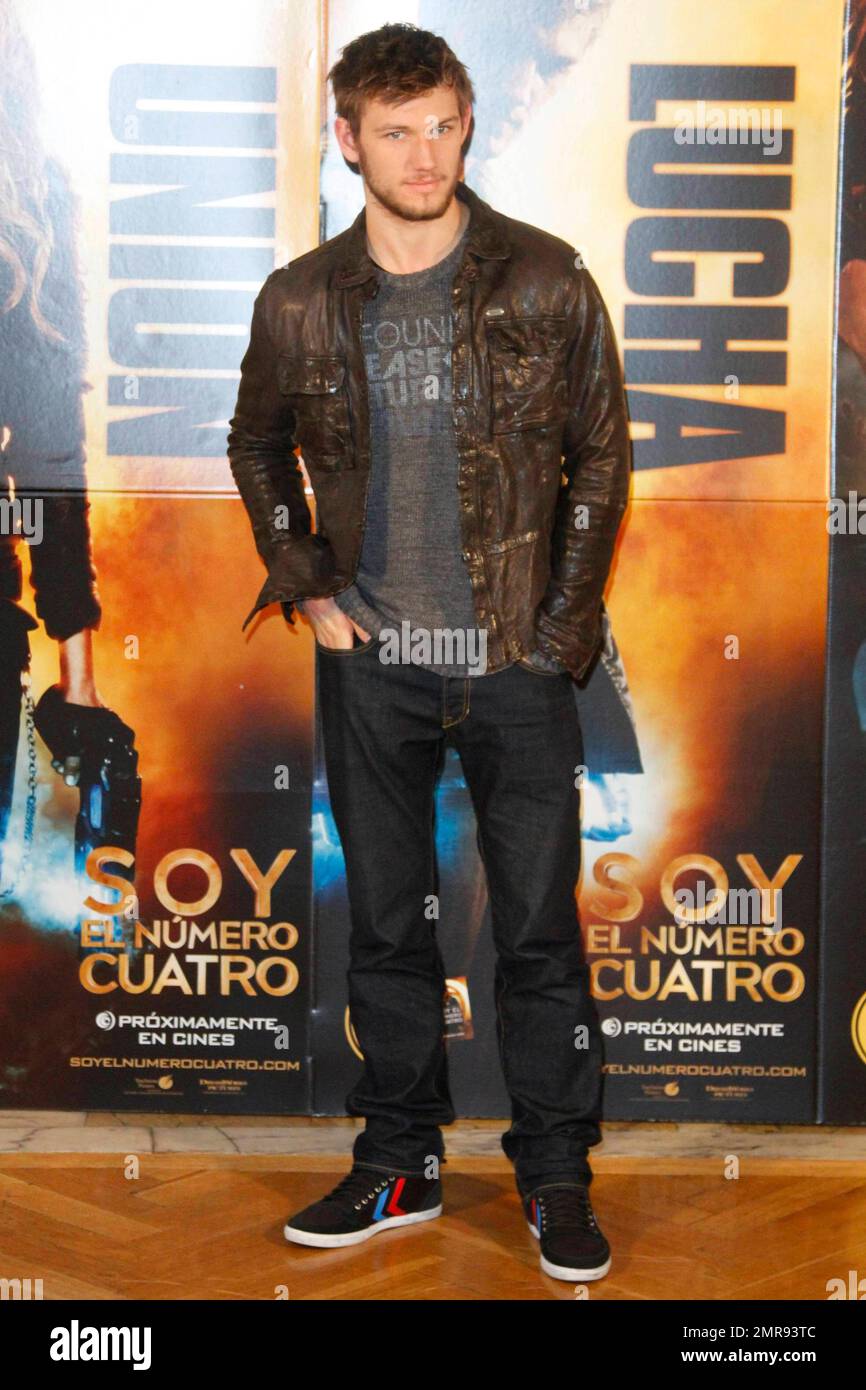SPAIN OUT - With a scruffy beard and in a leather jacket Alex Pettyfer ...