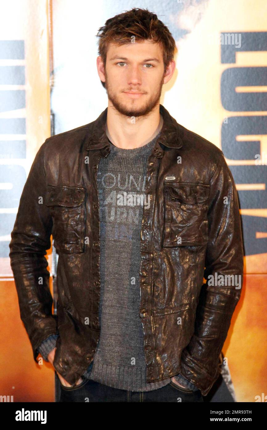 SPAIN OUT - With a scruffy beard and in a leather jacket Alex Pettyfer ...