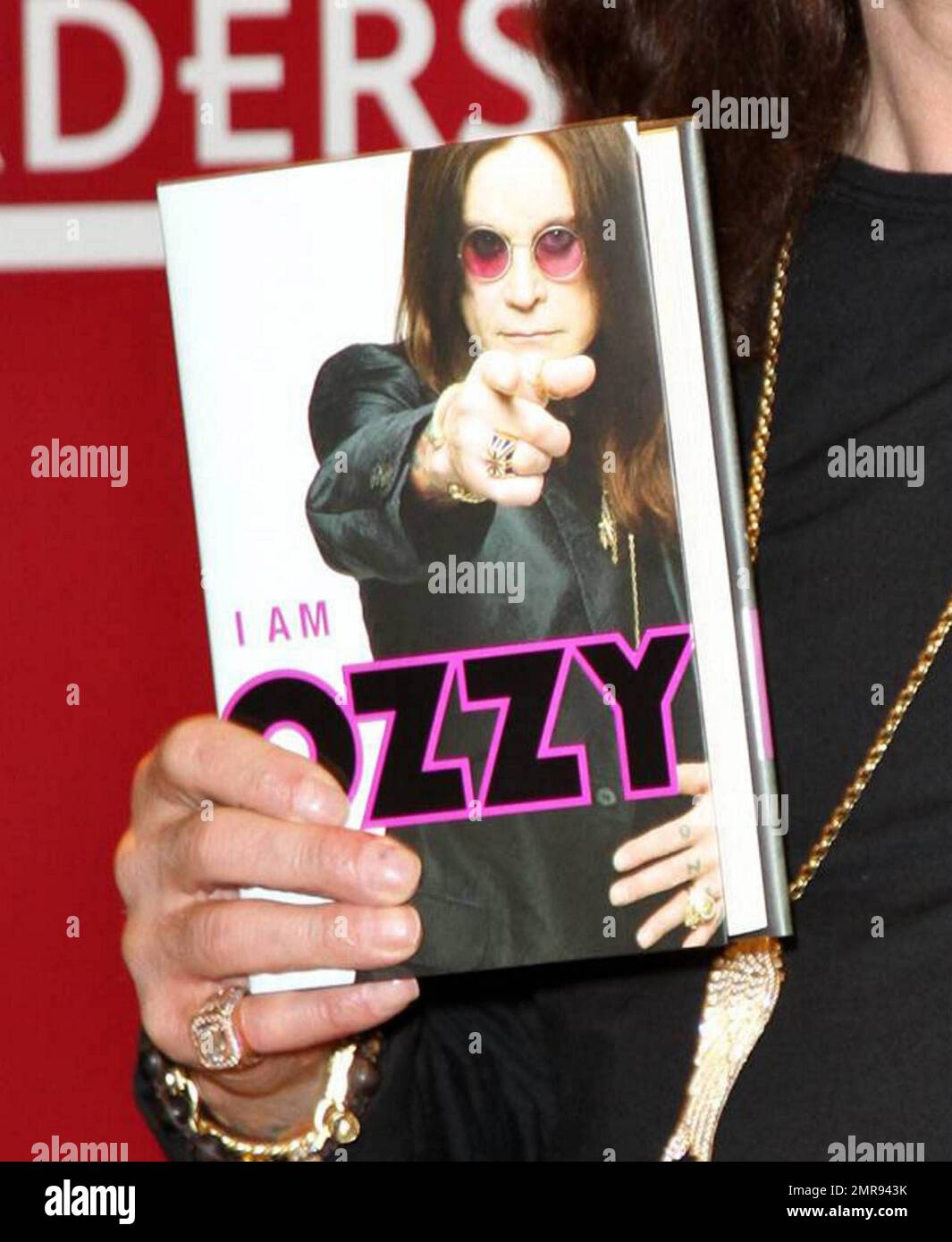 Ozzy Osbourne signs copies of his book "I Am Ozzy" at Borders Books ...