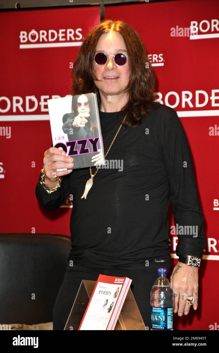 Ozzy Osbourne signs copies of his book "I Am Ozzy" at Borders Books ...